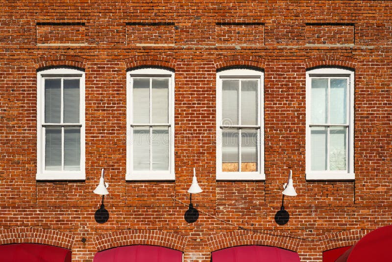 Red Brick Building Facade stock image. Image of brick - 24813943