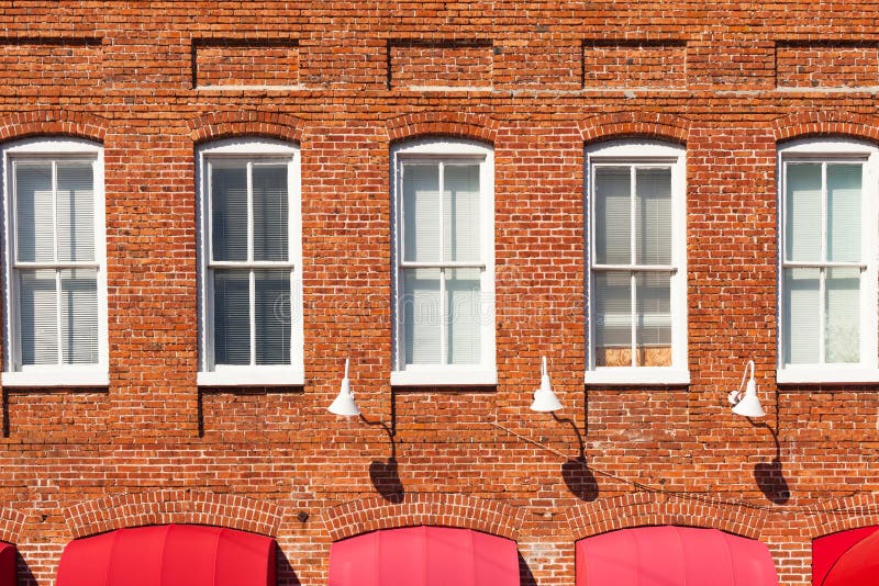 Red Brick Building Facade stock image. Image of brick - 24813943
