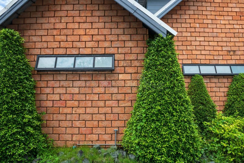 Red Brick Building with Spring Trees in Garden Stock Photo - Image of ...