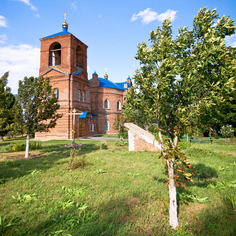 Red brick church in spring stock photo. Image of architectural - 115816412