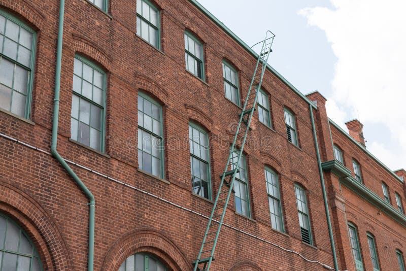 Red Brick Classic Industrial Building Facade with Multiple Windows ...