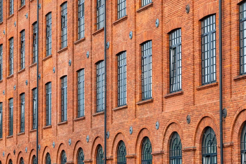 Red Brick Classic Industrial Building Facade with Multiple Windows ...