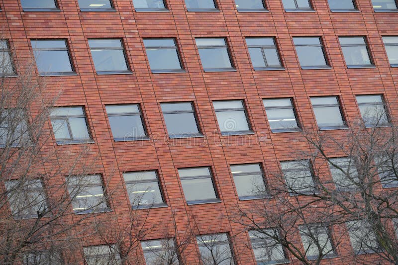 Red Brick Classic Industrial Building Facade with Multiple Windows ...