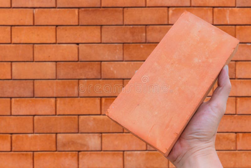 Red Brick for Construction Brick with Hand Hold Stock Photo - Image of ...