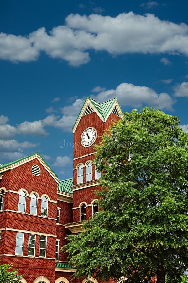 Red Brick Courthouse by Tree Stock Photo - Image of tourism, historic ...