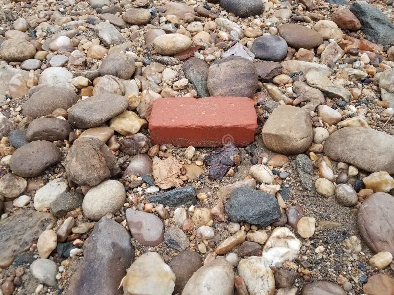 Red Brick on Ground with Stones and Rocks Stock Image - Image of ...