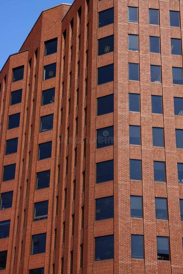 Red Brick Office with Dark Windows Stock Photo - Image of building ...