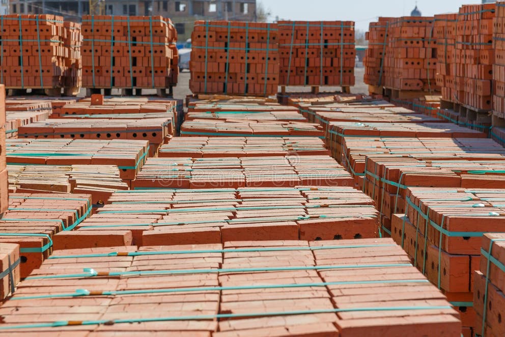 Red Brick Pallets at a Construction Site Stock Photo - Image of wall ...