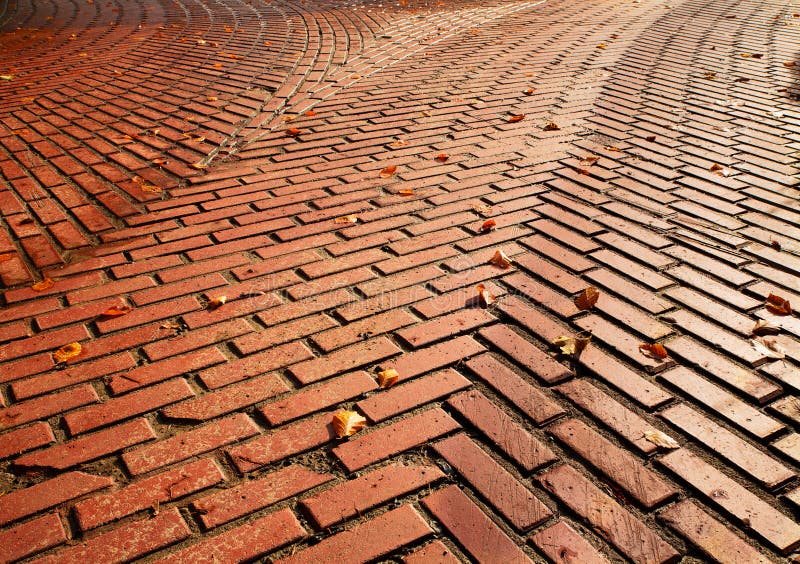 Red brick road split stock image. Image of paving, lines - 28034789