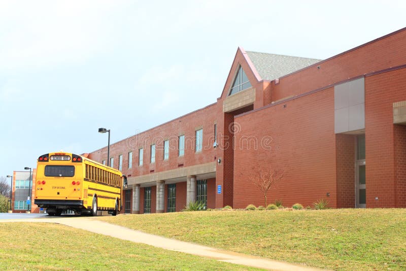 School Bus in Front of Building Stock Image - Image of door, facade ...