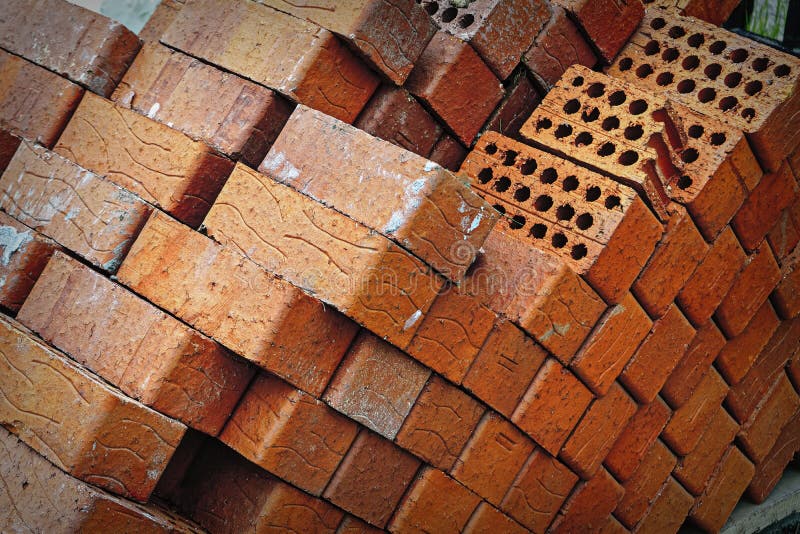 Red brick stack close-up stock image. Image of detail - 129964115