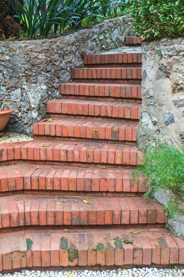 Red Bricks Stairway Tunnel Going Up with Light at the End Stock Photo ...