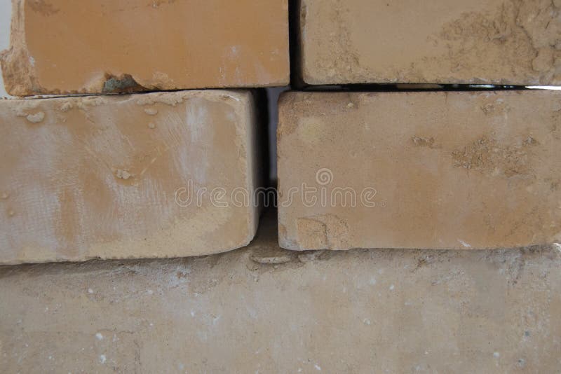 Red Brick Standing on Top of Each Other Stock Photo - Image of pile ...