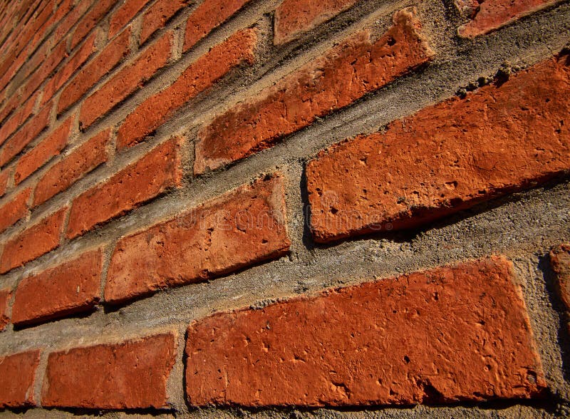 Red Brick Wall at an Angle stock image. Image of block - 60179643