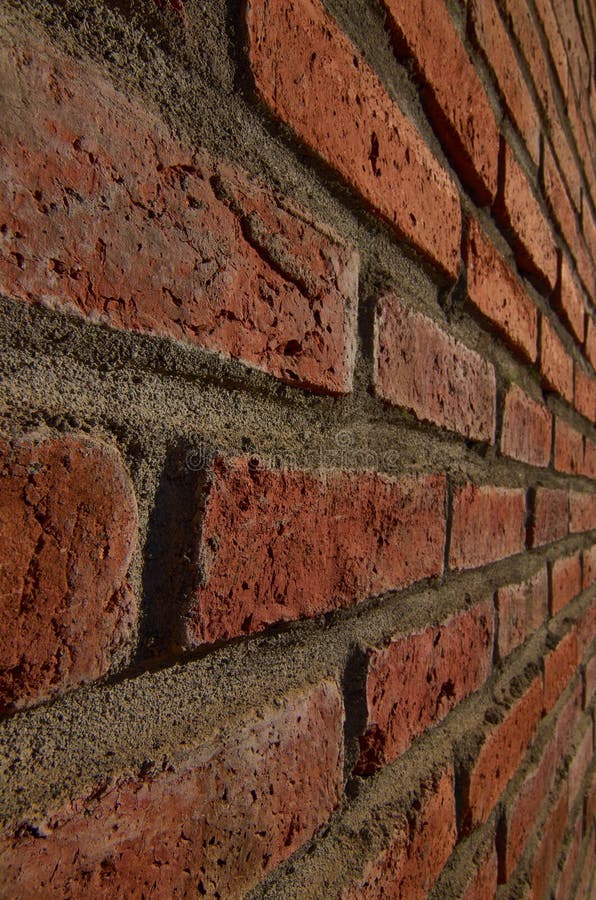Red Brick Wall at an Angle stock image. Image of block - 60179643