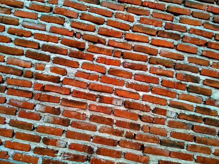 A Red Brick Wall Arranged Using a Running Bond Technique Forming a ...