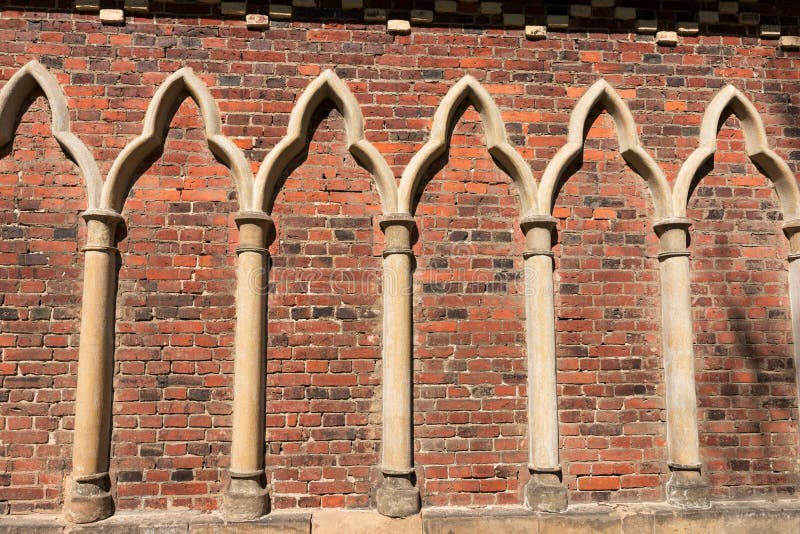 Red brick wall with arch stock photo. Image of mortar - 2335868