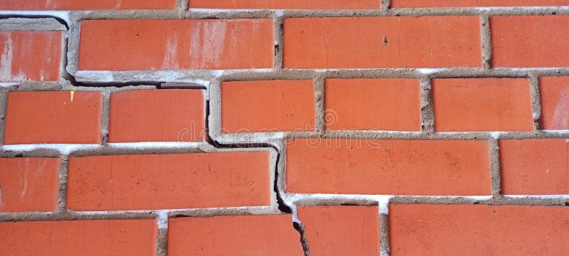 The Red Brick Wall Cracked. Crack on the Red Wall. Stock Image - Image ...