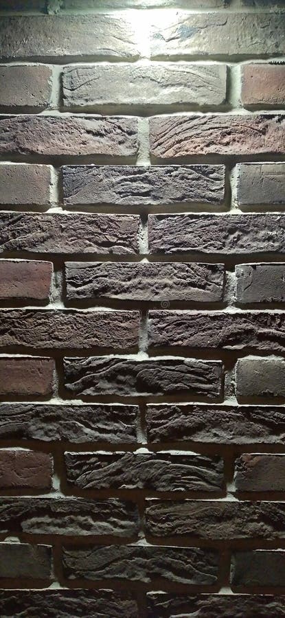Brick Wall Illuminated from Above Stock Image - Image of stonewall ...