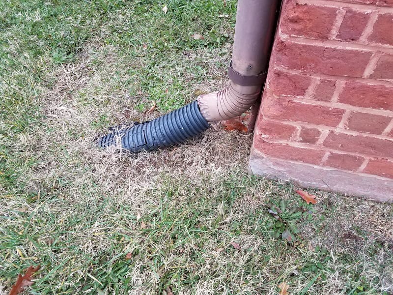 Red Brick Wall or Masonry with Gutter Downspout and Grass Stock Image ...