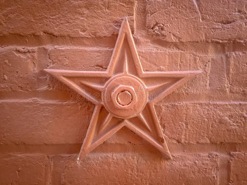 Red Brick Wall with Star Detail Stock Image - Image of concrete, rock ...