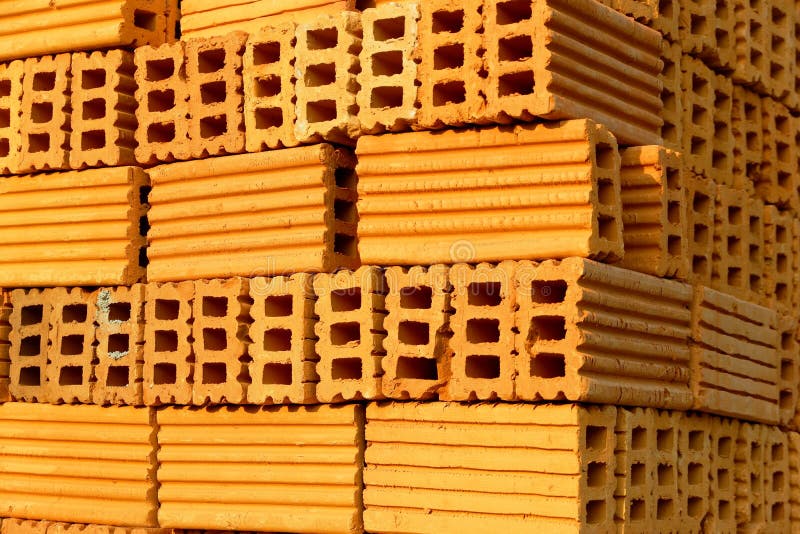 Red Bricks for Building in Construction Site. Stock Photo - Image of ...