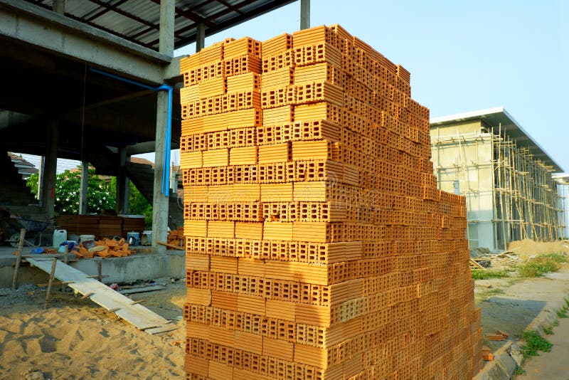 Red Bricks for Building in Construction Site. Stock Image - Image of ...