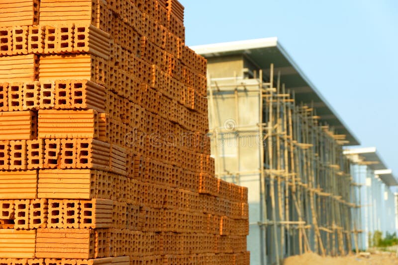 Red Bricks for Building in Construction Site. Stock Image - Image of ...