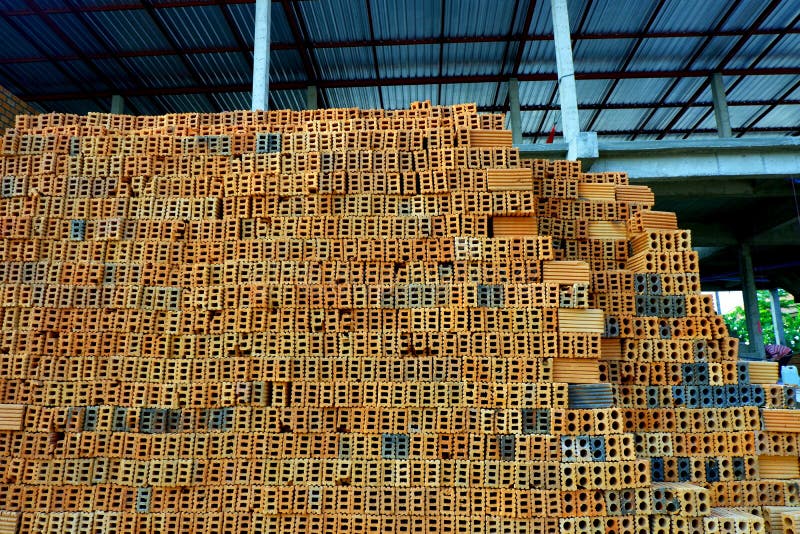 Red Bricks for Building in Construction Site. Stock Photo - Image of ...