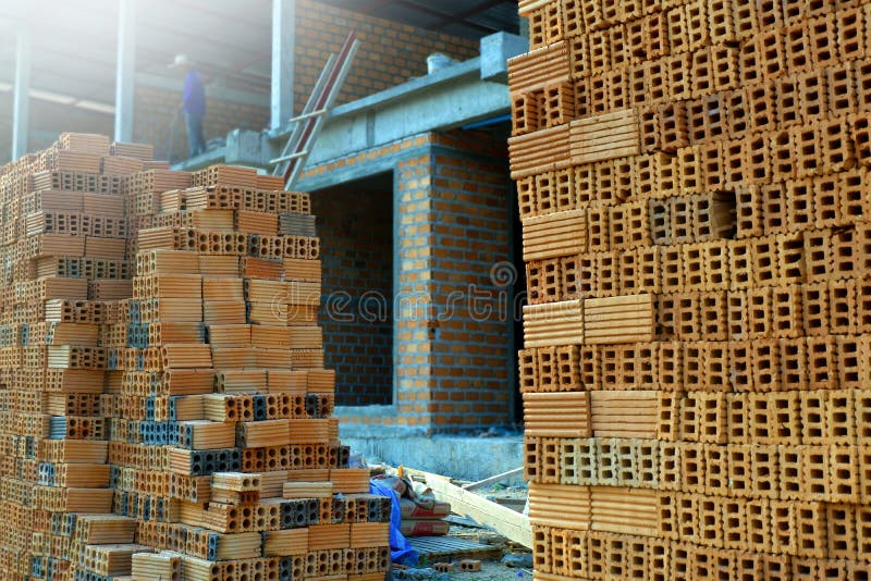 Red Bricks for Building in Construction Site. Stock Photo - Image of ...