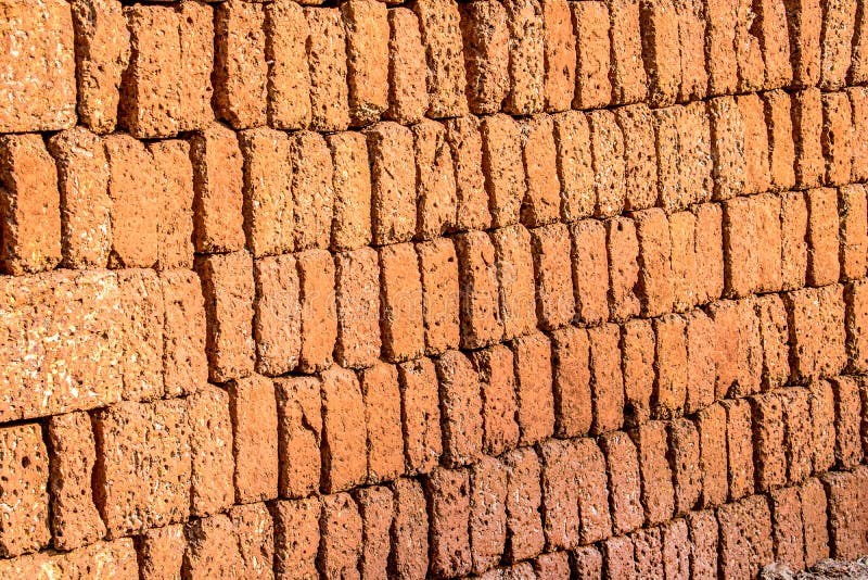 A Red Bricks Folded in a Row. Stock Photo - Image of building ...