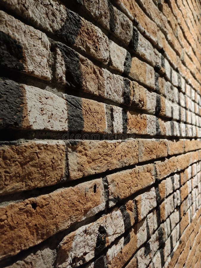 Red bricks forming a wall stock photo. Image of wood - 267117488