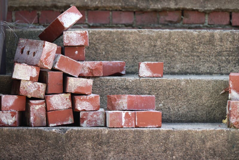 Red Bricks Stacked on Concrete Steps Stock Image - Image of lines ...