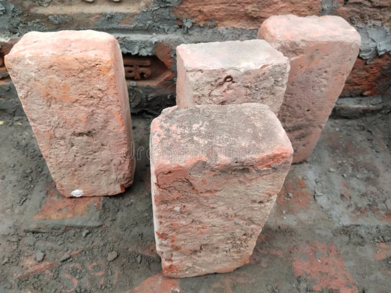 Red Bricks Stacked at a Construction Site, Close-up. the Bare Brick ...
