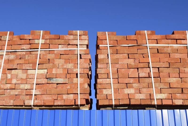 Red Bricks Stacked Into Cubes. Warehouse Bricks. Storage Brickwo Stock ...