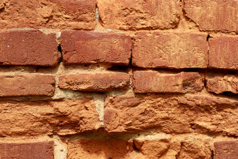 Red bricks stacked in rows stock image. Image of rough - 99657857