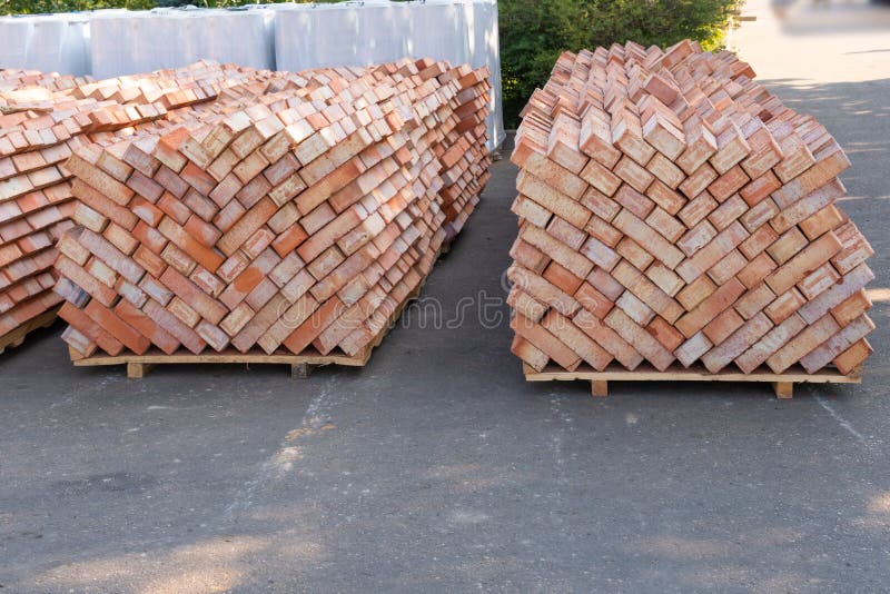 Brown Bricks Stacked Together To Build a House Stock Photo - Image of ...