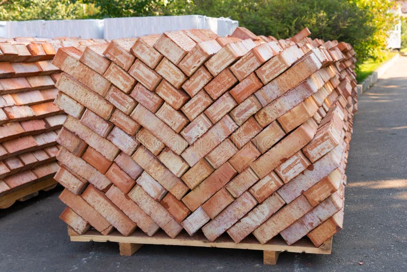 Brown Bricks Stacked Together To Build a House Stock Image - Image of ...