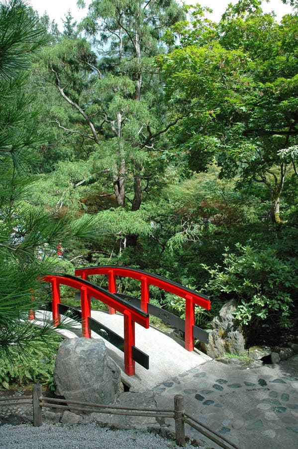 Classic Red Bridge in a Japanese Garden Stock Photo - Image of plants ...
