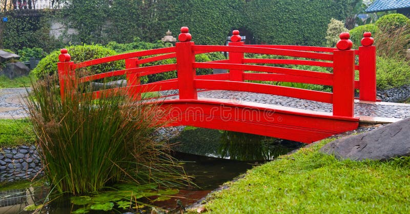 Red bridge in garden stock photo. Image of beauty, grass - 13679360