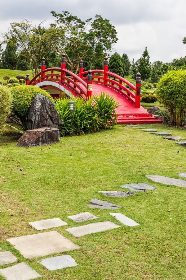 Red Bridge in a Japanese Garden Stock Image - Image of ornamental ...