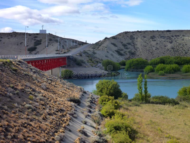 Red Bridge Over a Bright Blue River in Patagonia Stock Image - Image of ...
