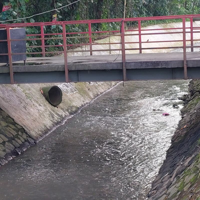 Red Bridge Over the River with Clear Water Stock Image - Image of canal ...