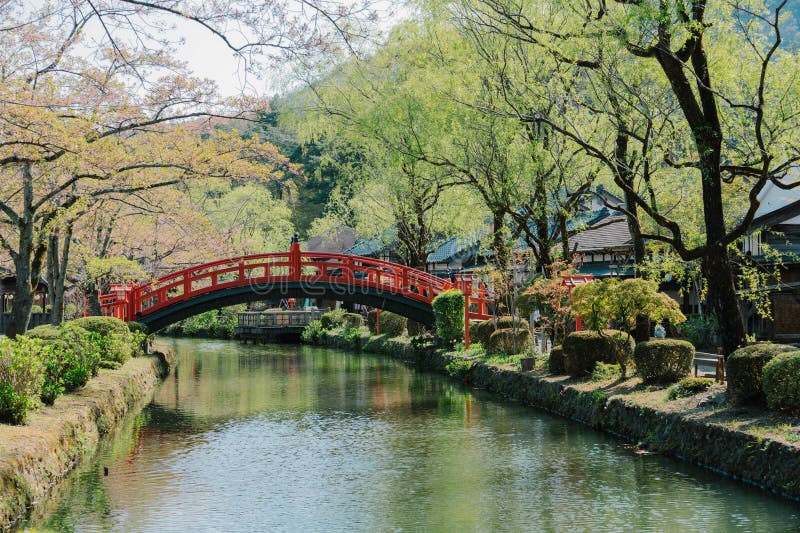 Red Bridge Over the River in Edo Wonderland, Japan Stock Image - Image ...