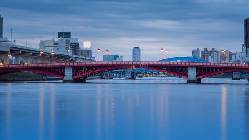 Red bridge over river stock image. Image of odaiba, dawn - 64346581