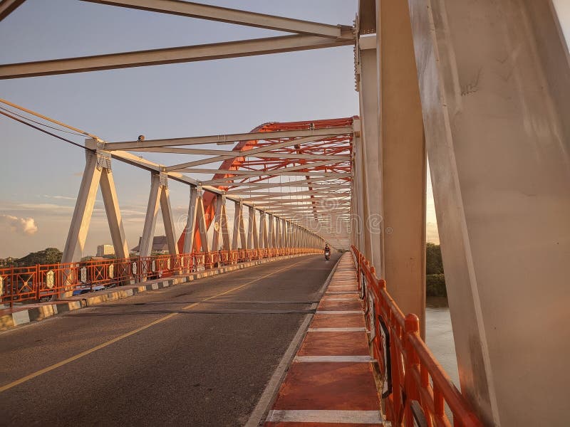 A Red Bridge, with a Unique Reflection of the Twilight Light Stock ...