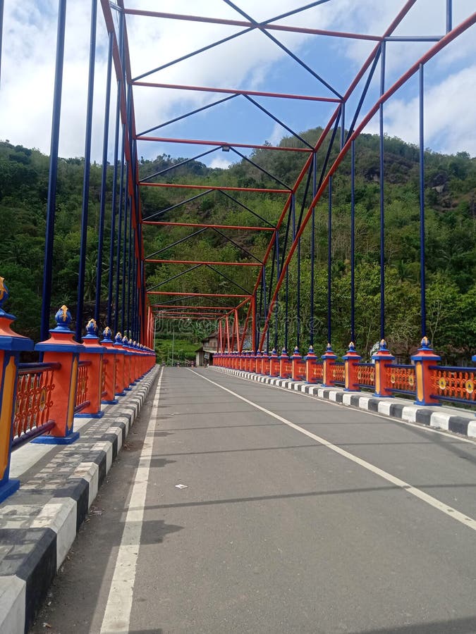 Red Bridge in the village stock image. Image of forget - 261954237
