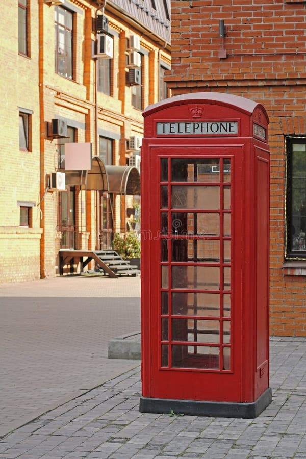 Red British Telephone Booth Used As Street Library in Winter Stock ...