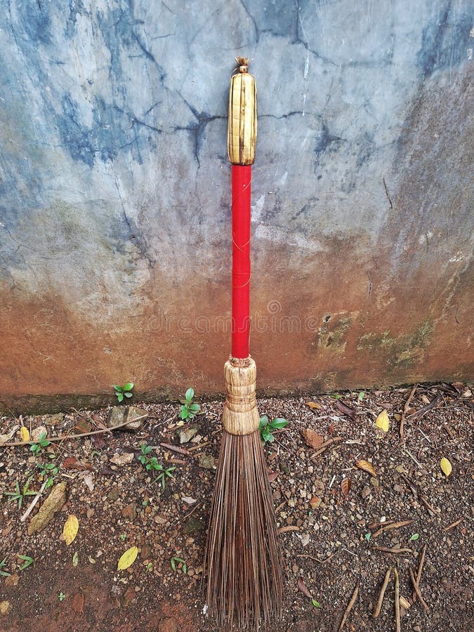 Red broom in the yard stock photo. Image of broomstick - 374425968