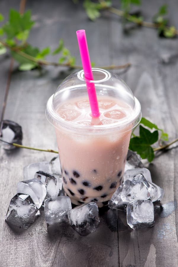 Red Bubble Tea and Black Tapioca Pearls on Crushed Ice Stock Photo ...
